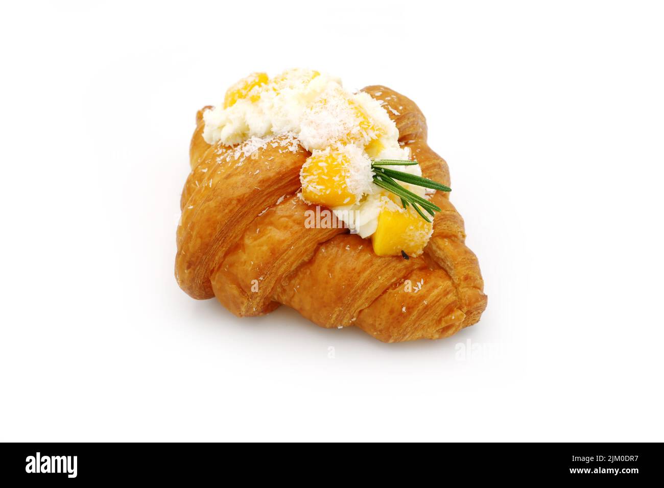 A delicious croissant with fruit topping isolated on white background ...