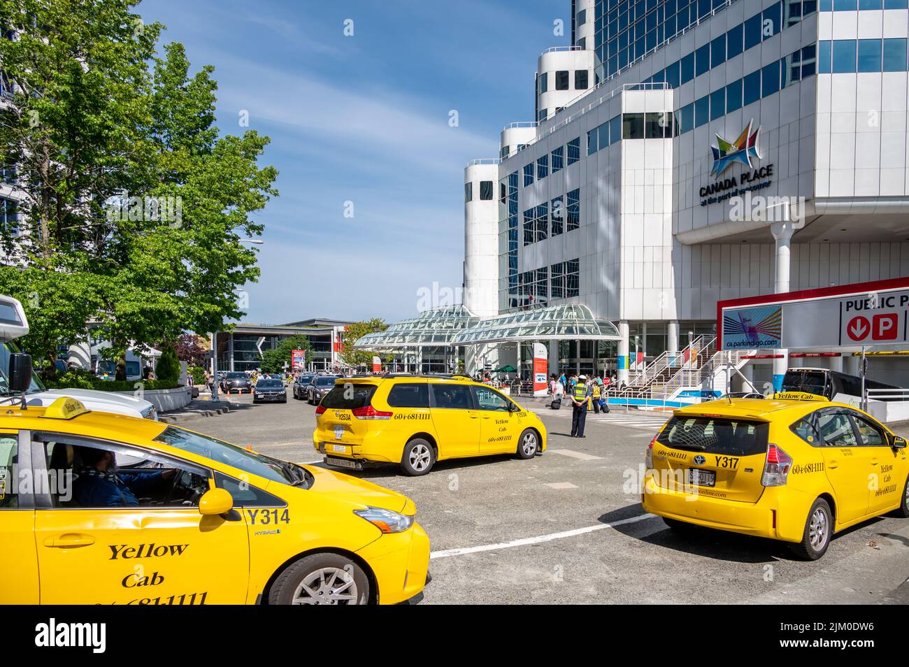 Vancouver, British Columbia, Canada - July 24, 2022: Taxi cabs bringing ...