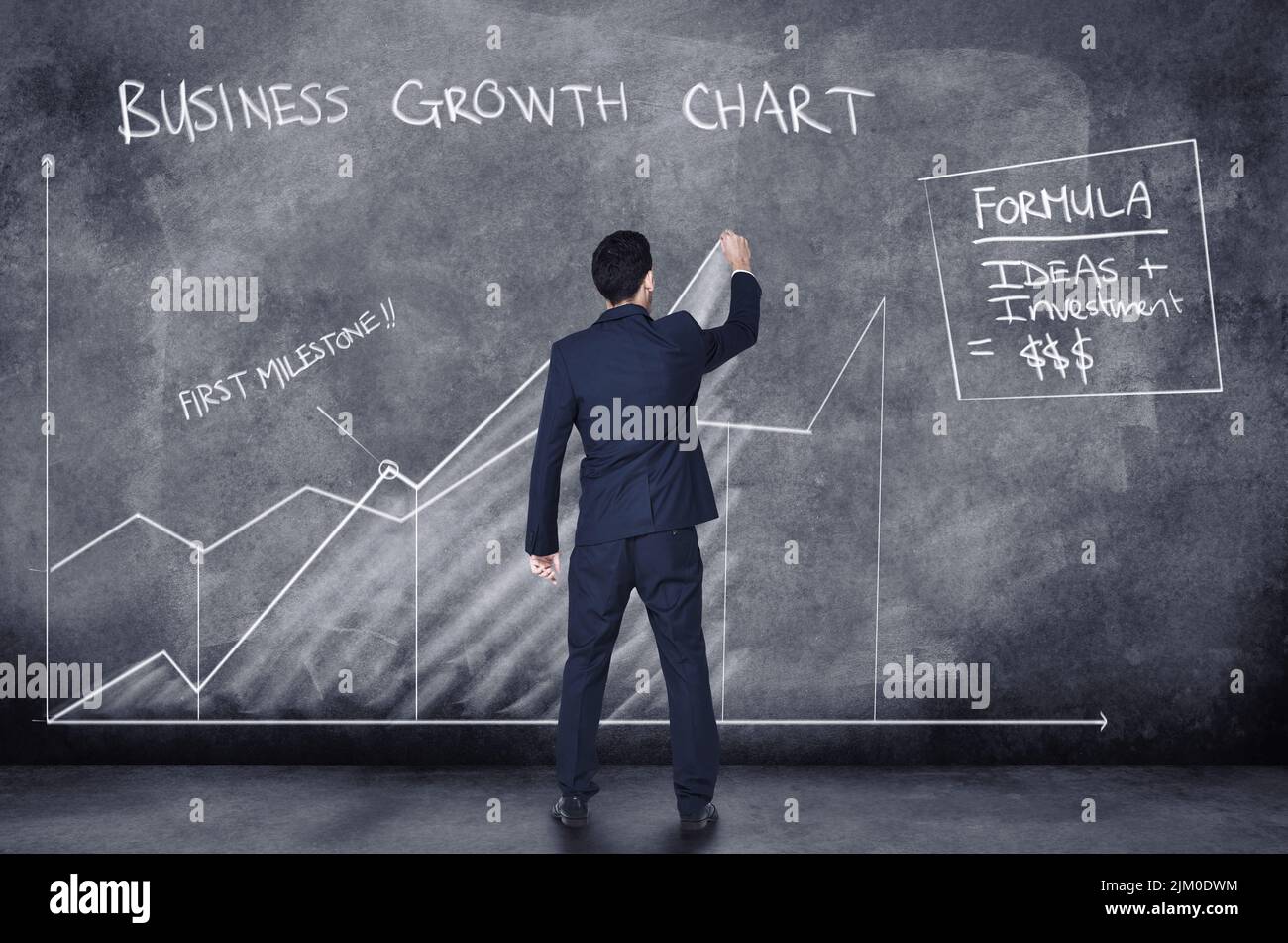 Finance businessman writing on CGI graphic chart while analyzing ...