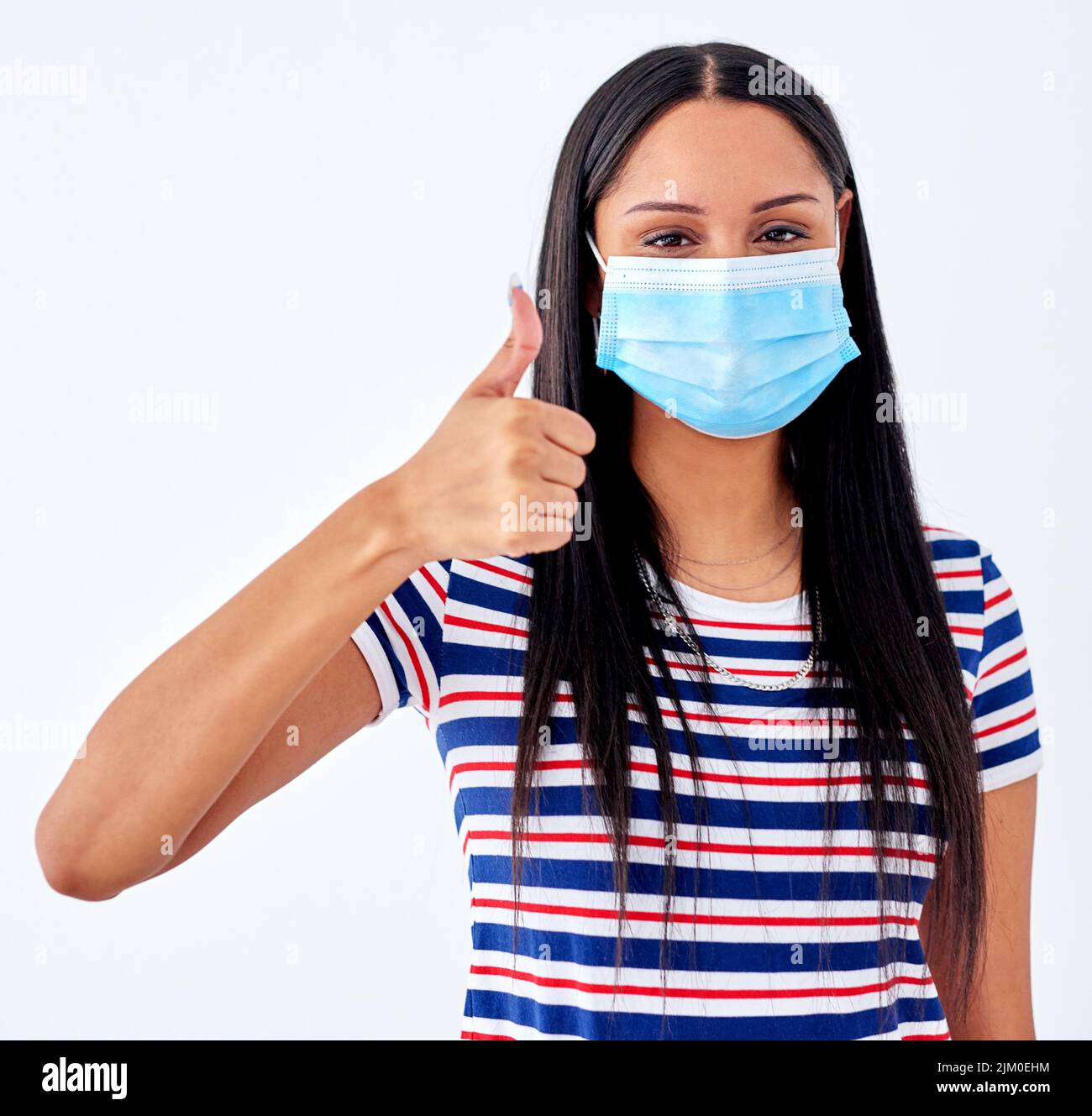 Keeping a positive mindset in the pandemic. Studio portrait of a young ...