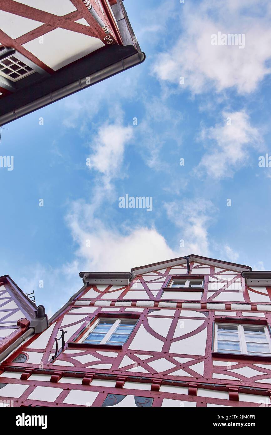 A low angle shot of a house with red lines in Monreal, Eifel region ...