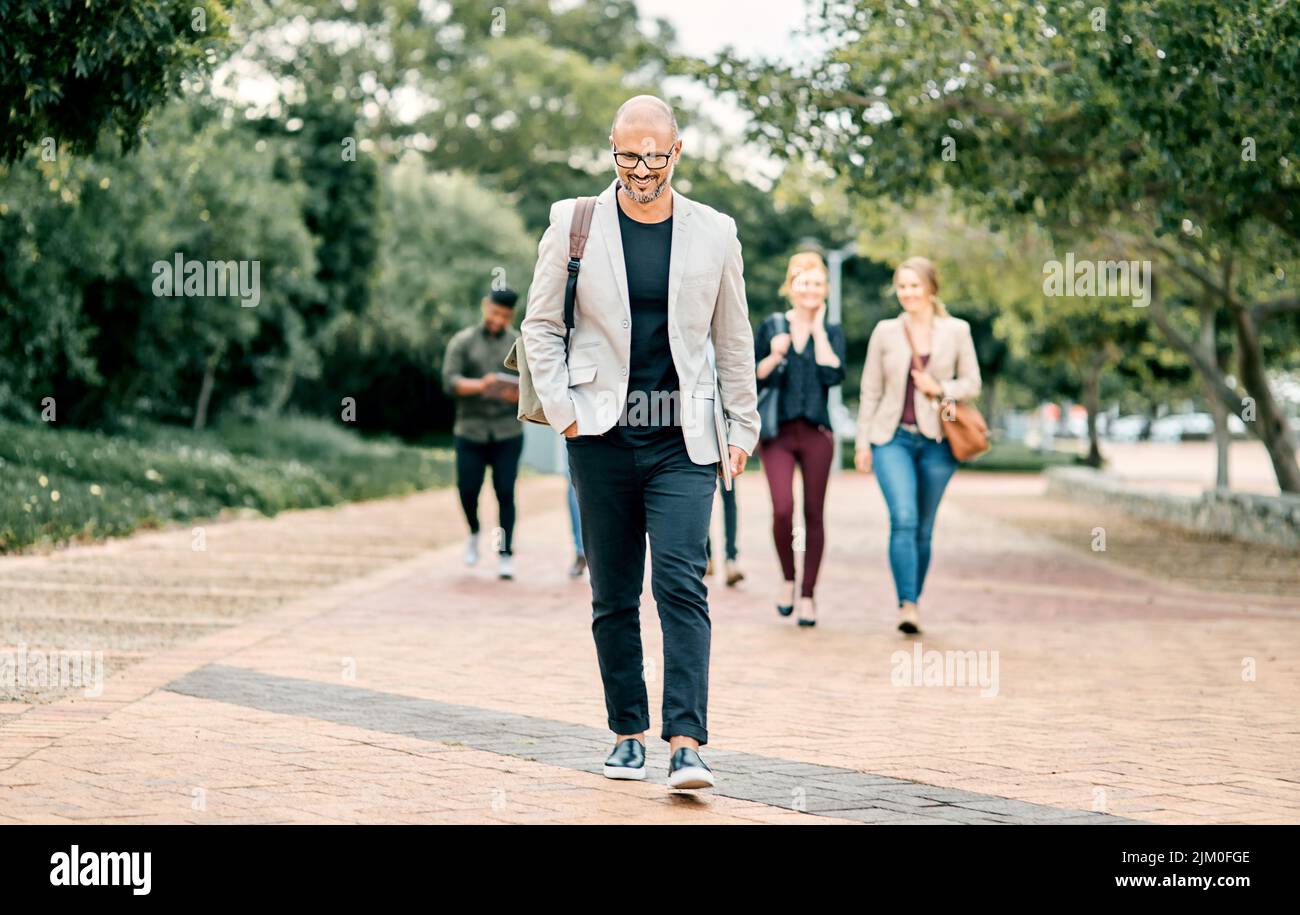 An obstacle is often a stepping stone. a confident mature businessman ...