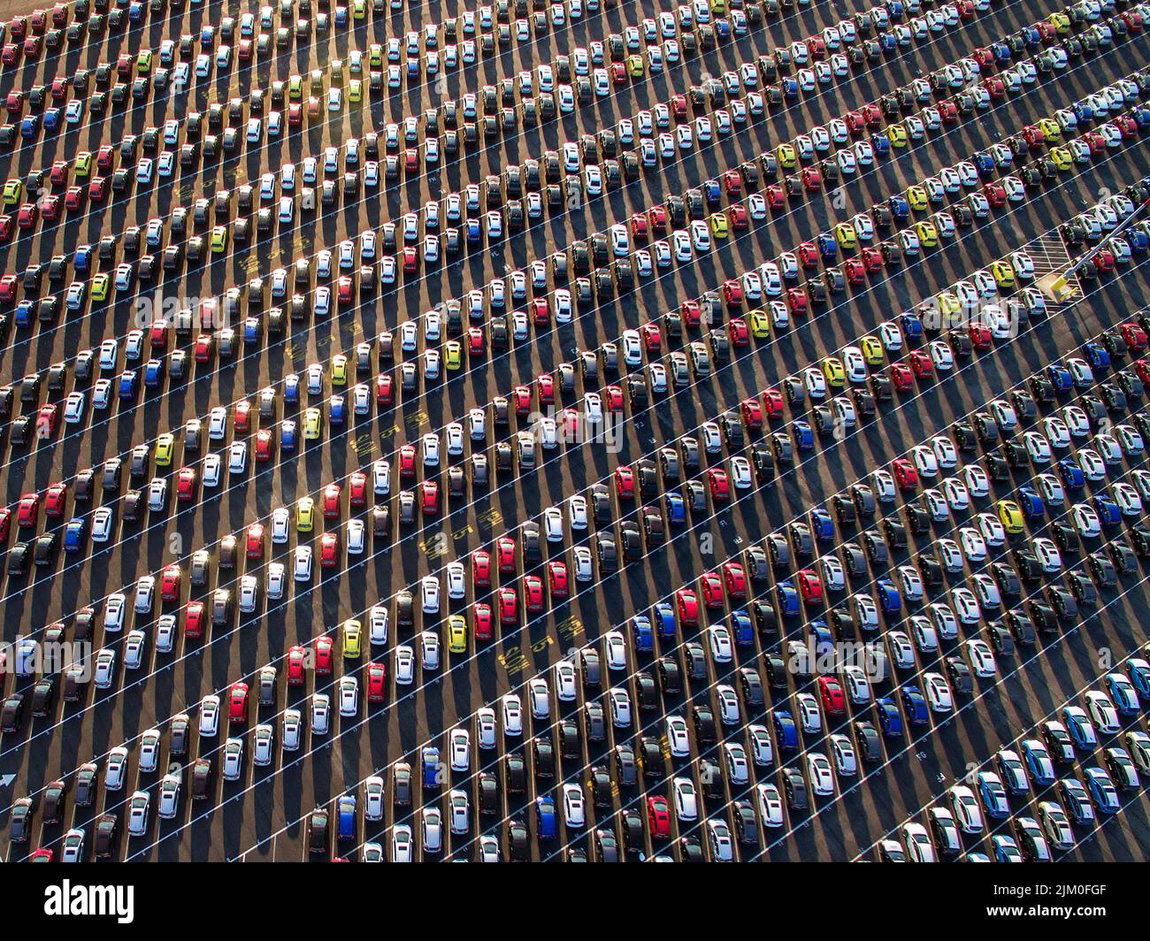 A beautiful aerial view of a parking lot with many cars at the Port of ...