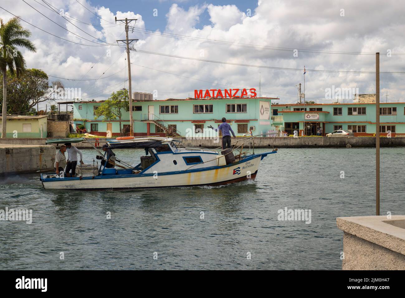 A beautiful shot of fishermen arriving from the fishing in the deep sea ...