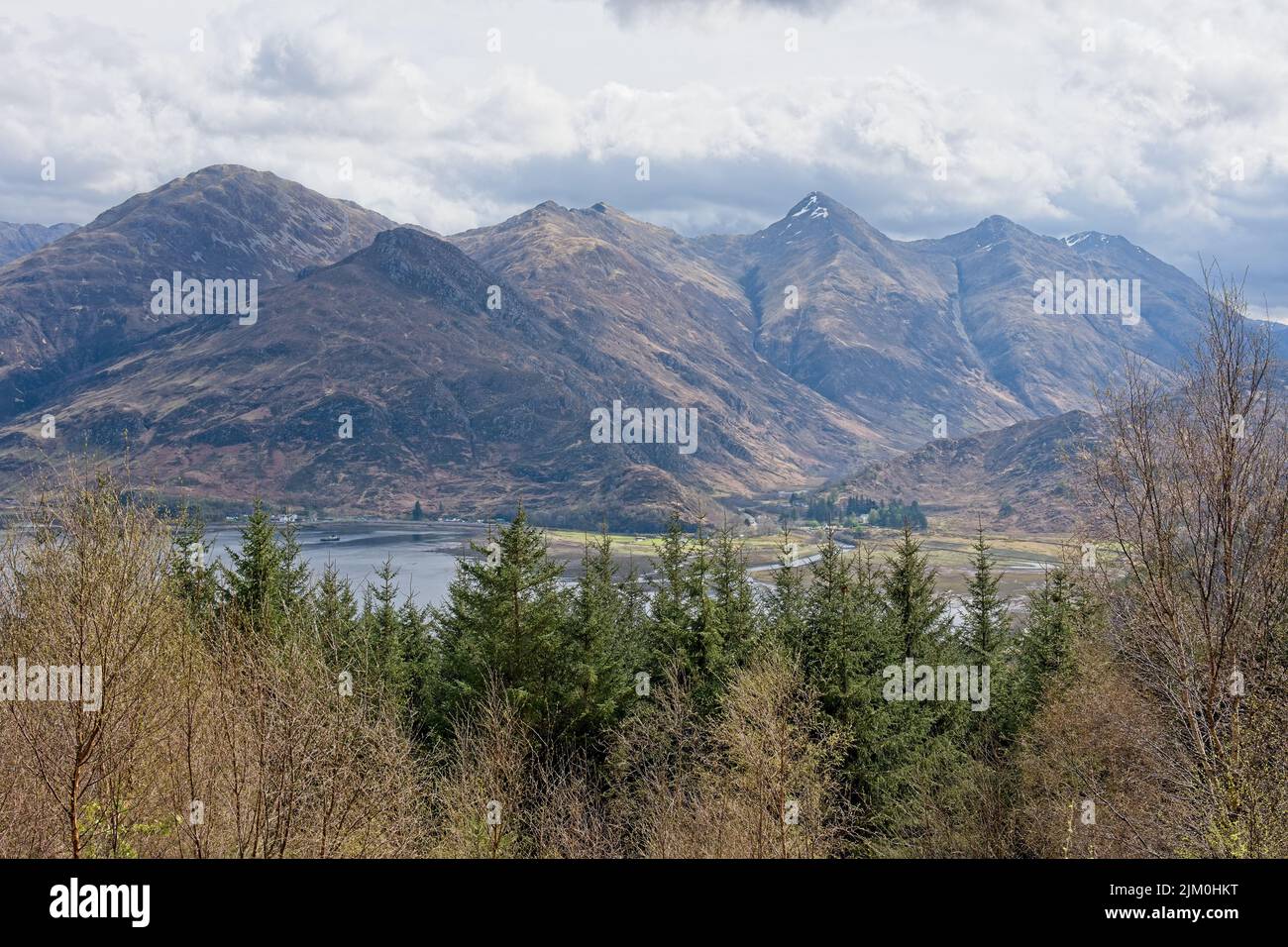 A beautiful view of the Five Sisters of Kintail mountains in Loch Duich ...