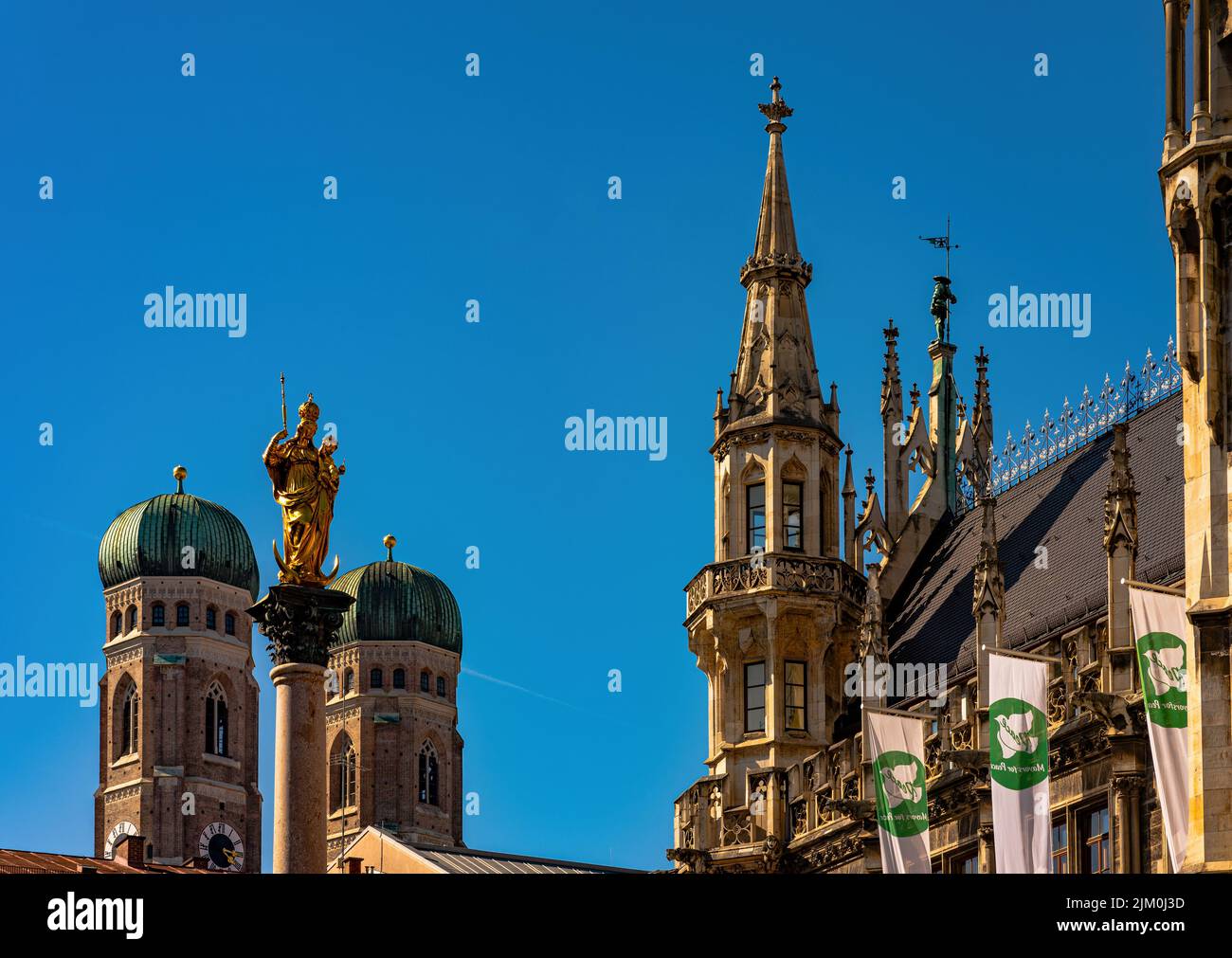 a shot of the famous Munich city centre with the famous towers of ...