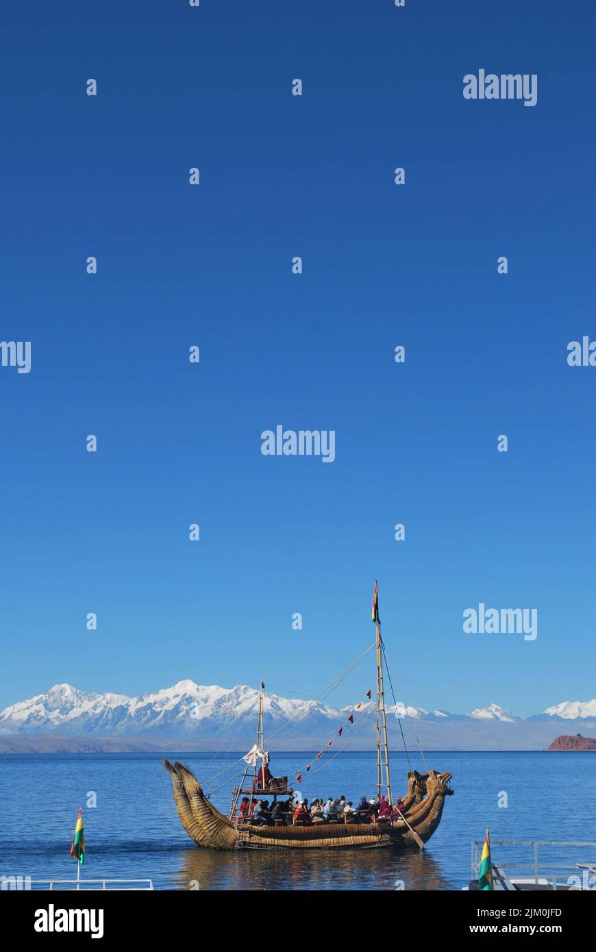 An aged ship filled with tourists in Lake Titicaca between Peru and ...