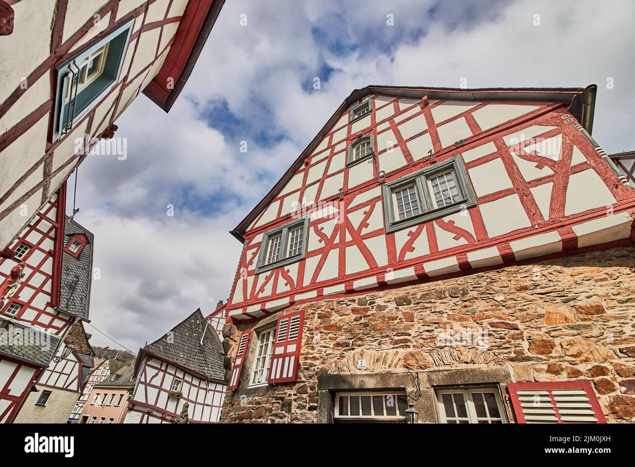 A low angle exterior traditional buildings with windows in the old ...
