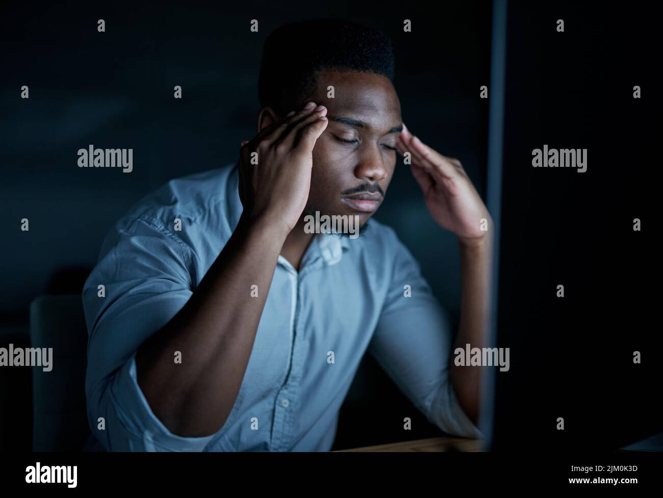 Pressure rising, productivity falling. a young businessman looking ...