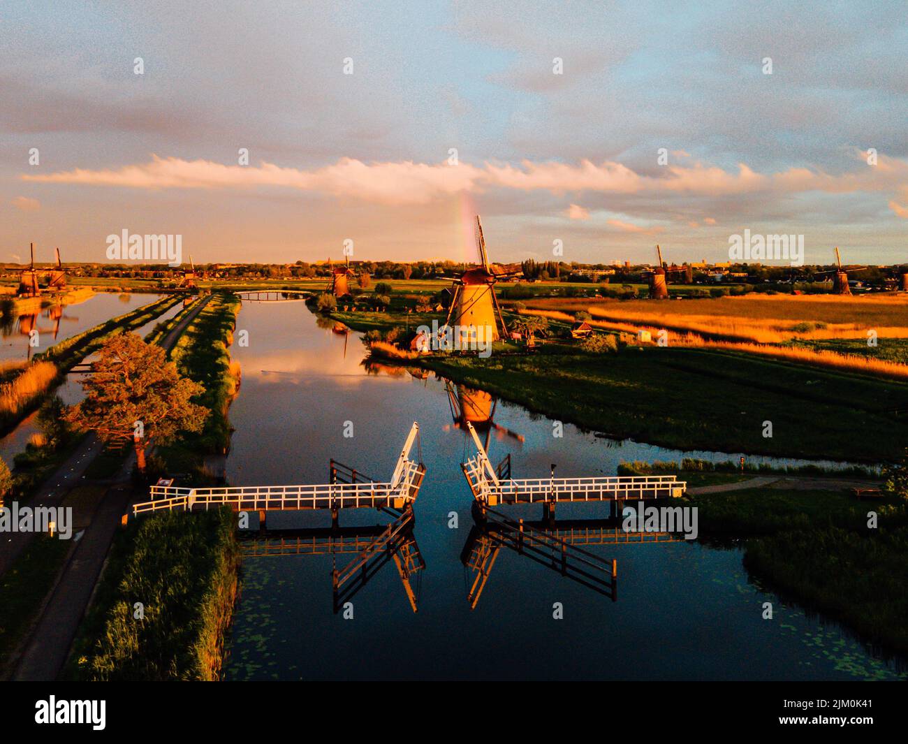 Aerial view of traditional windmills at sunset in Kinderdijk, The ...