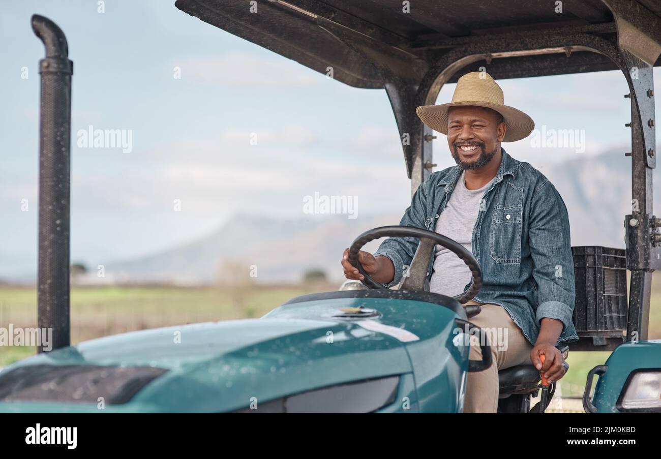 Man driving tractor hi-res stock photography and images - Alamy