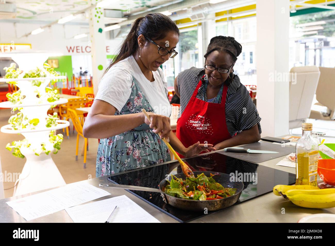 EDITORIAL USE ONLY Participants attend a recipe development class from ...