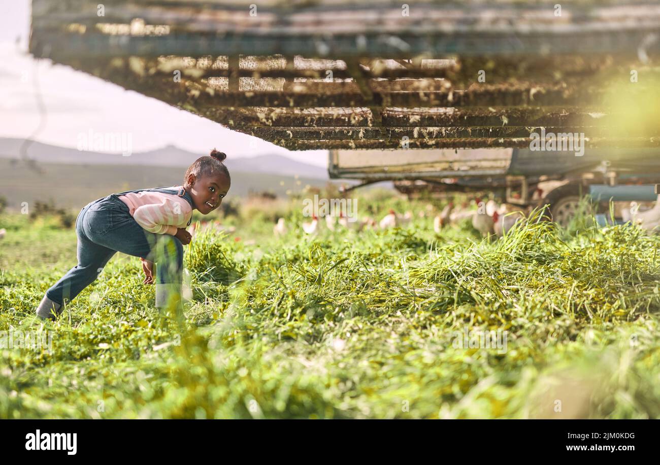 Everyday is an adventure when you live on a farm. a cute little girl ...