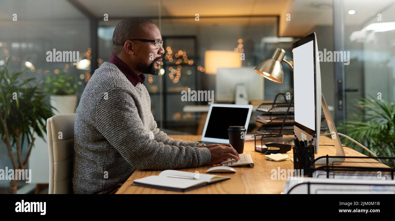 Working alone at night hi-res stock photography and images - Alamy