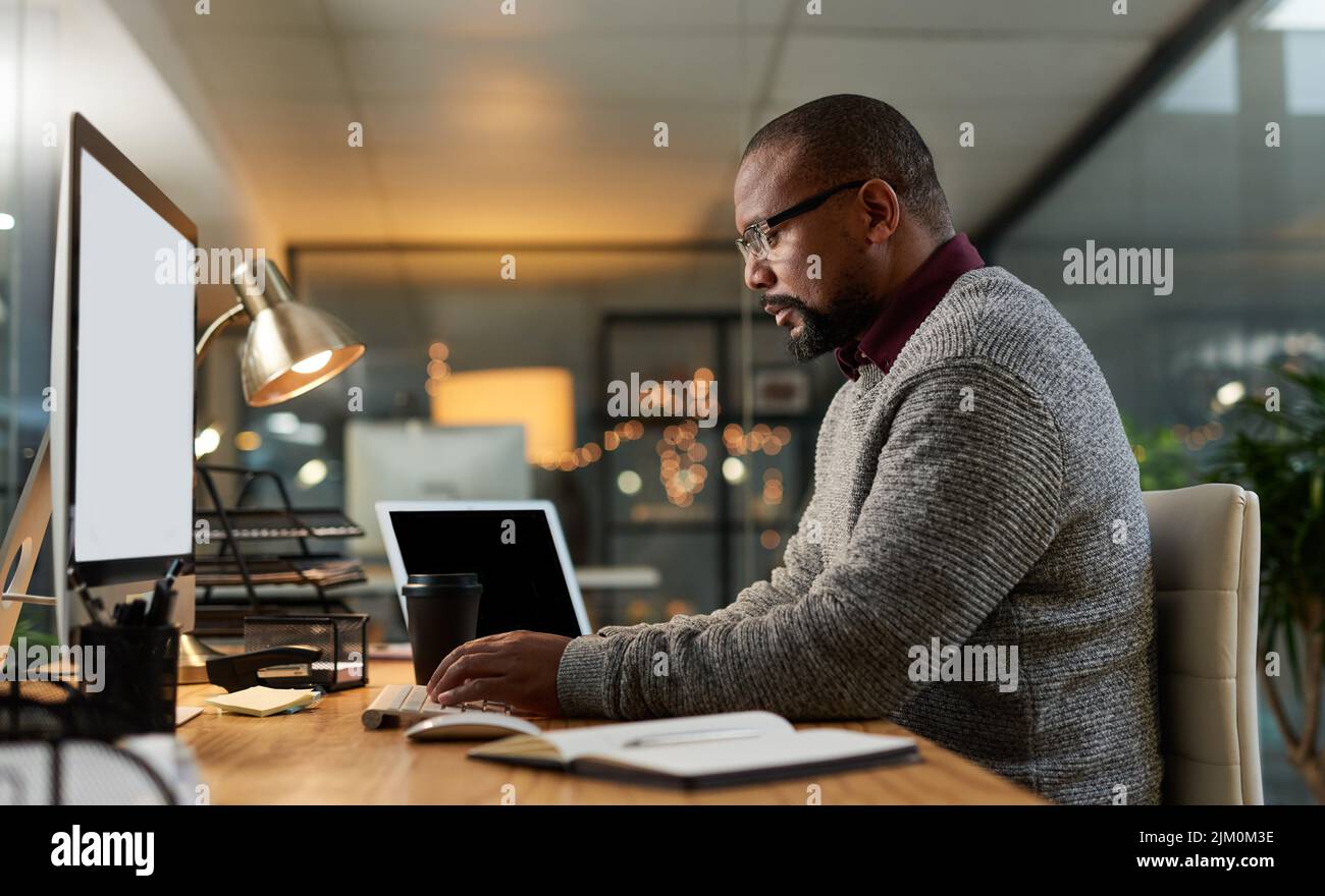 Working alone at night hi-res stock photography and images - Alamy