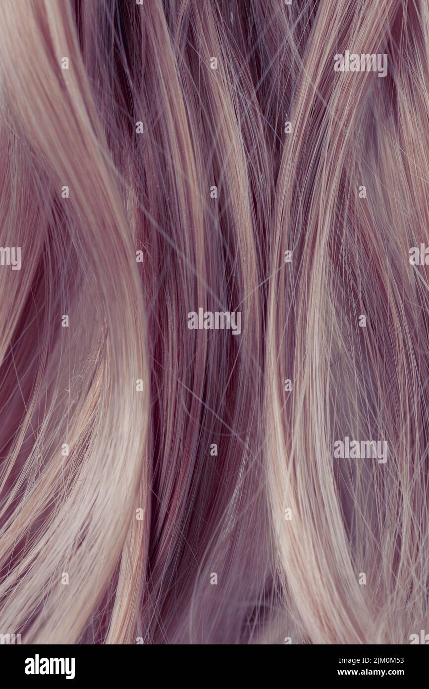 Purple curly hair texture closeup. Toned purple hair background Stock ...