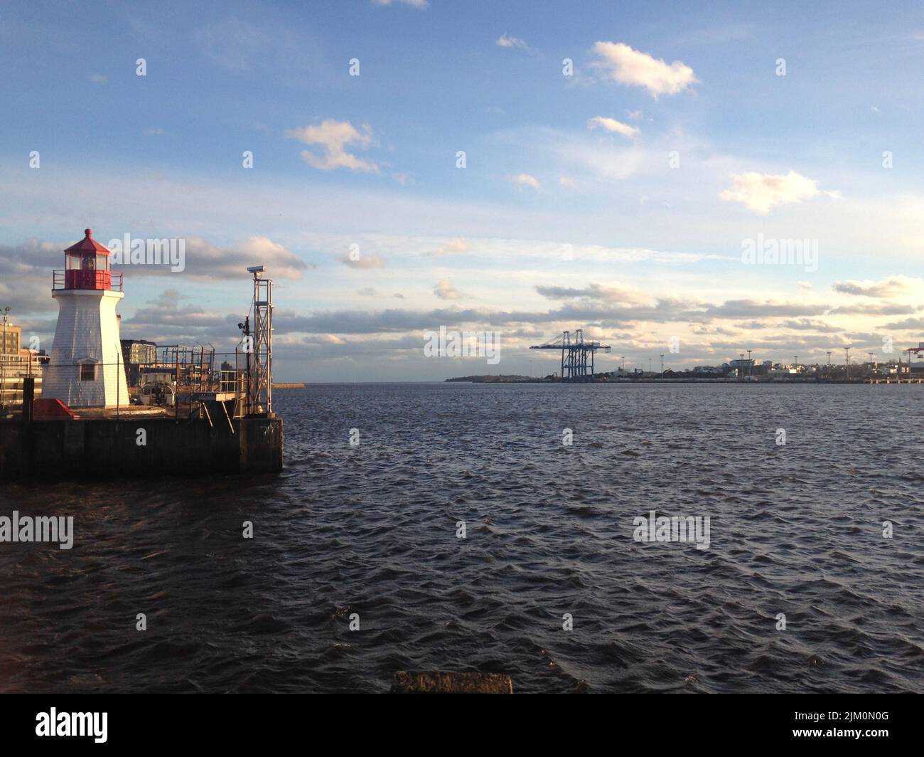 The Saint John Coast Guard Base Lighthouse in Saint John Harbor against ...