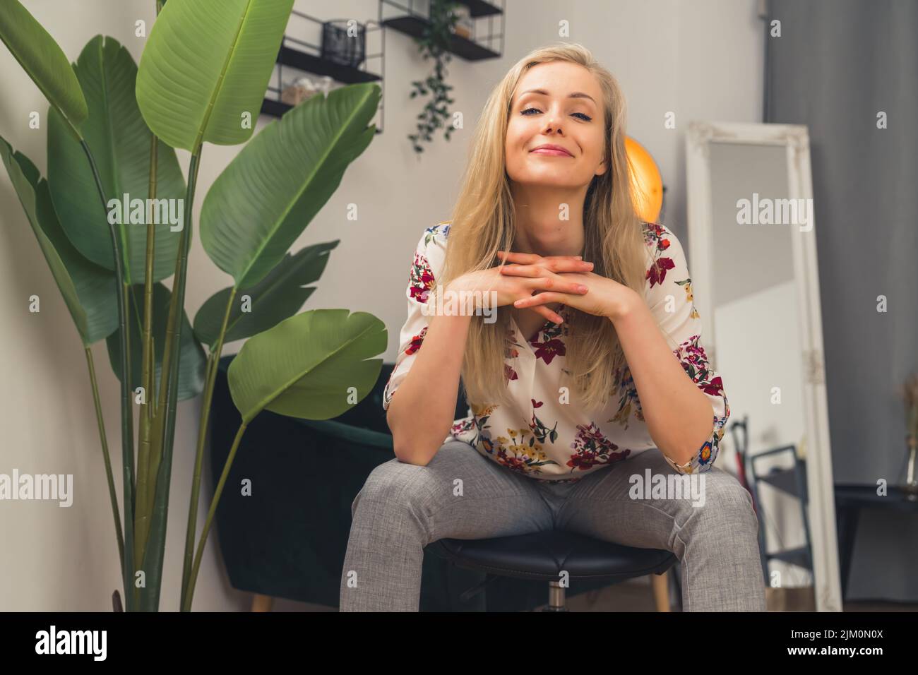 Woman resting head on arms hi-res stock photography and images - Alamy