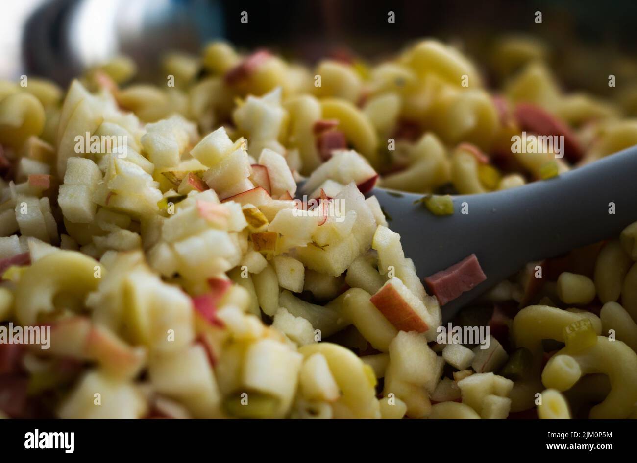 A close up slicing apple on a chopping board Stock Photo - Alamy