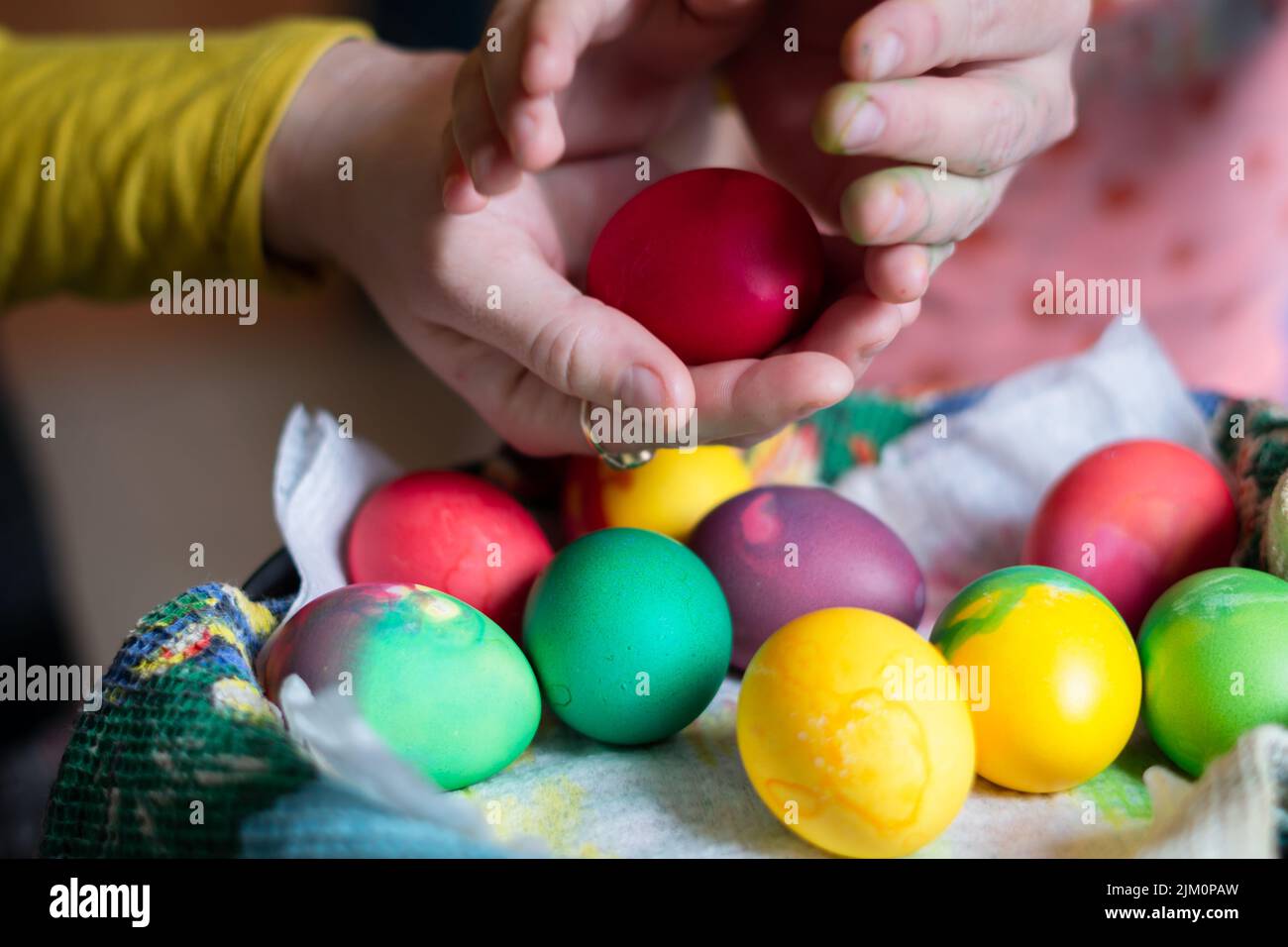 A close up easter eggs in hand Stock Photo - Alamy