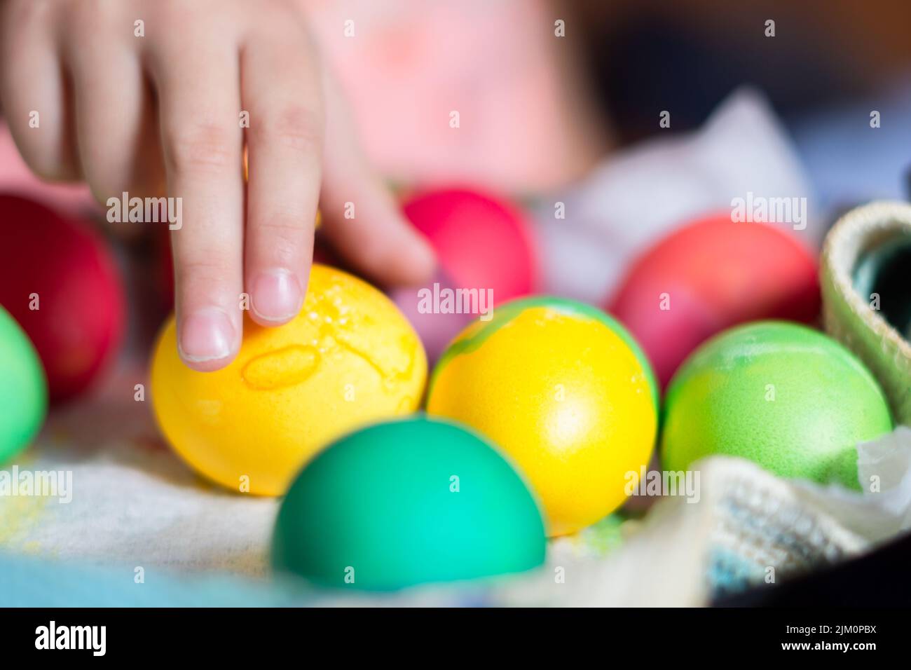 A close up easter eggs in hand Stock Photo - Alamy