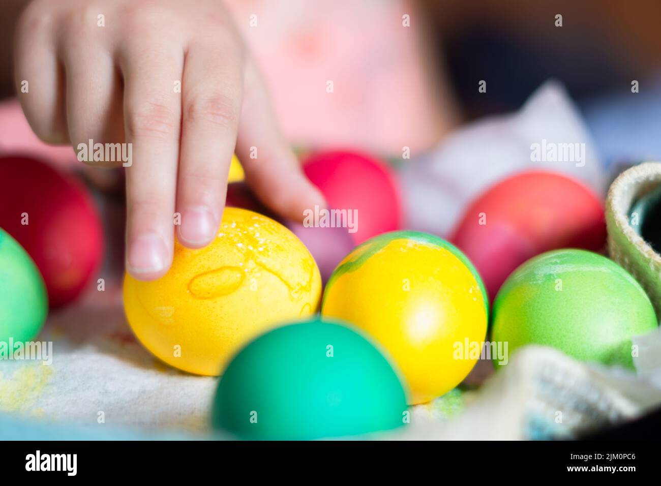 A close up easter eggs in hand Stock Photo - Alamy
