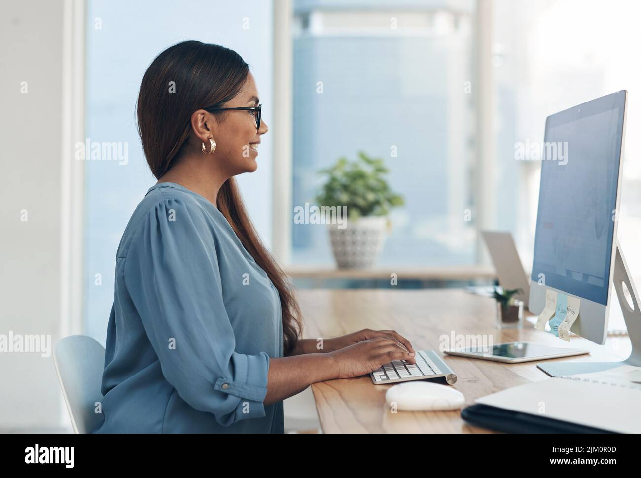 Woman Working At Computer