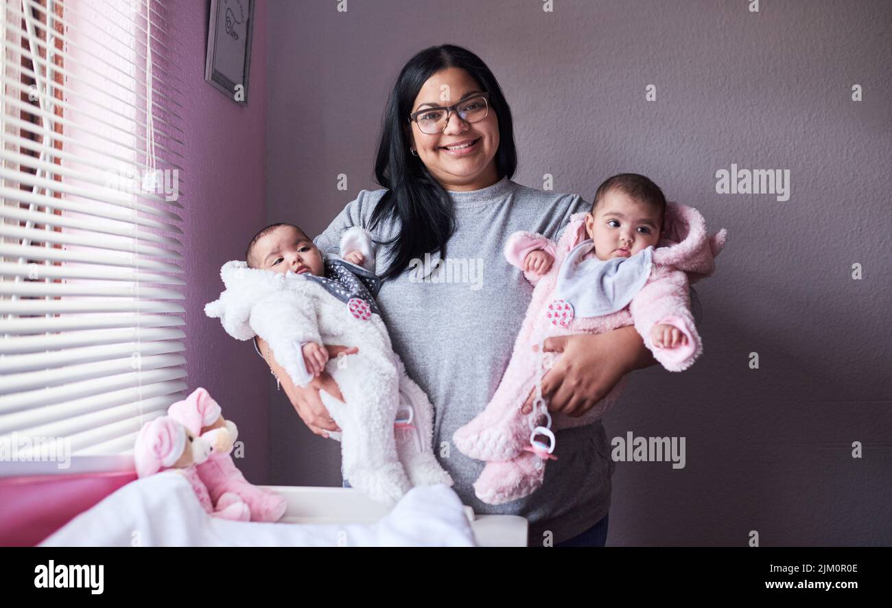 I made a wish, it came true twice. a young woman carrying her twin baby ...