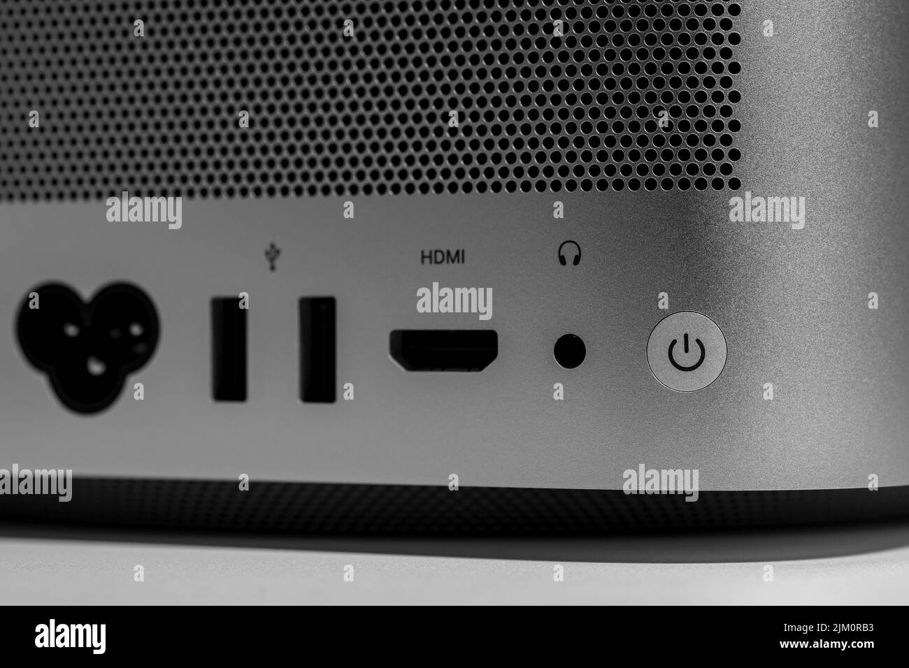 On button icon and ports on low key still life of modern new desktop ...