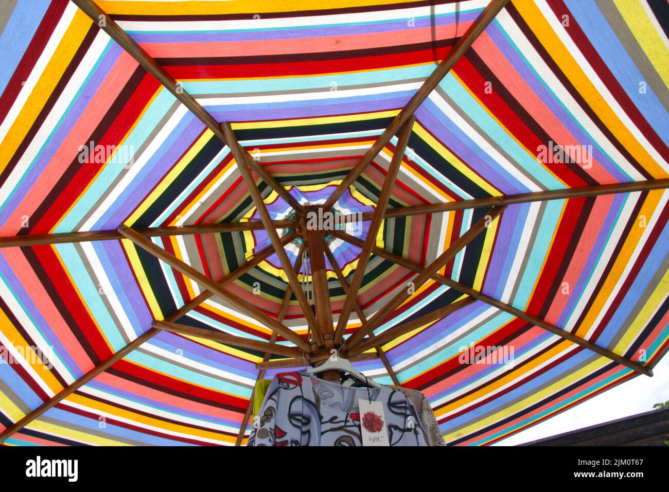 A colorful parasol at a tourist stand on the Fraueninsel on the ...