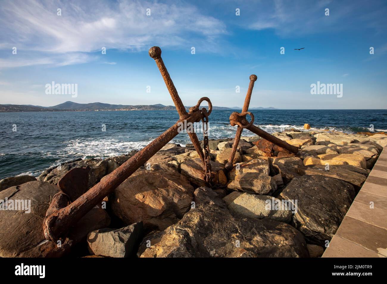 The old rusty anchors on the seacoast in St. Tropez, France Stock Photo ...