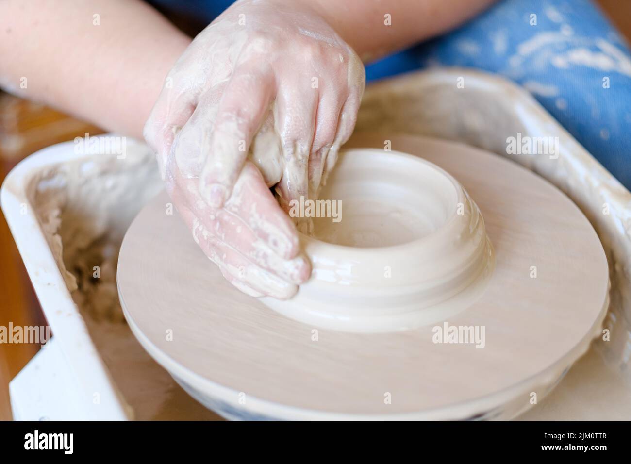 pottery skill traditional art potter modeling clay Stock Photo - Alamy