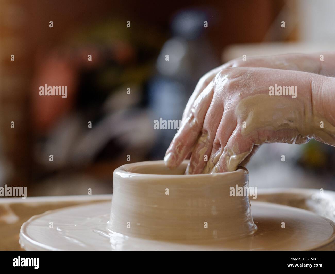 Pottery wheel hands hi-res stock photography and images - Alamy
