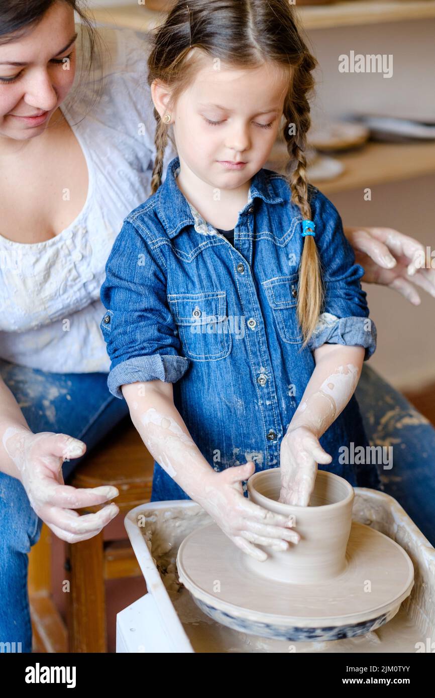 child hobby creative pottery leisure art girl clay Stock Photo - Alamy