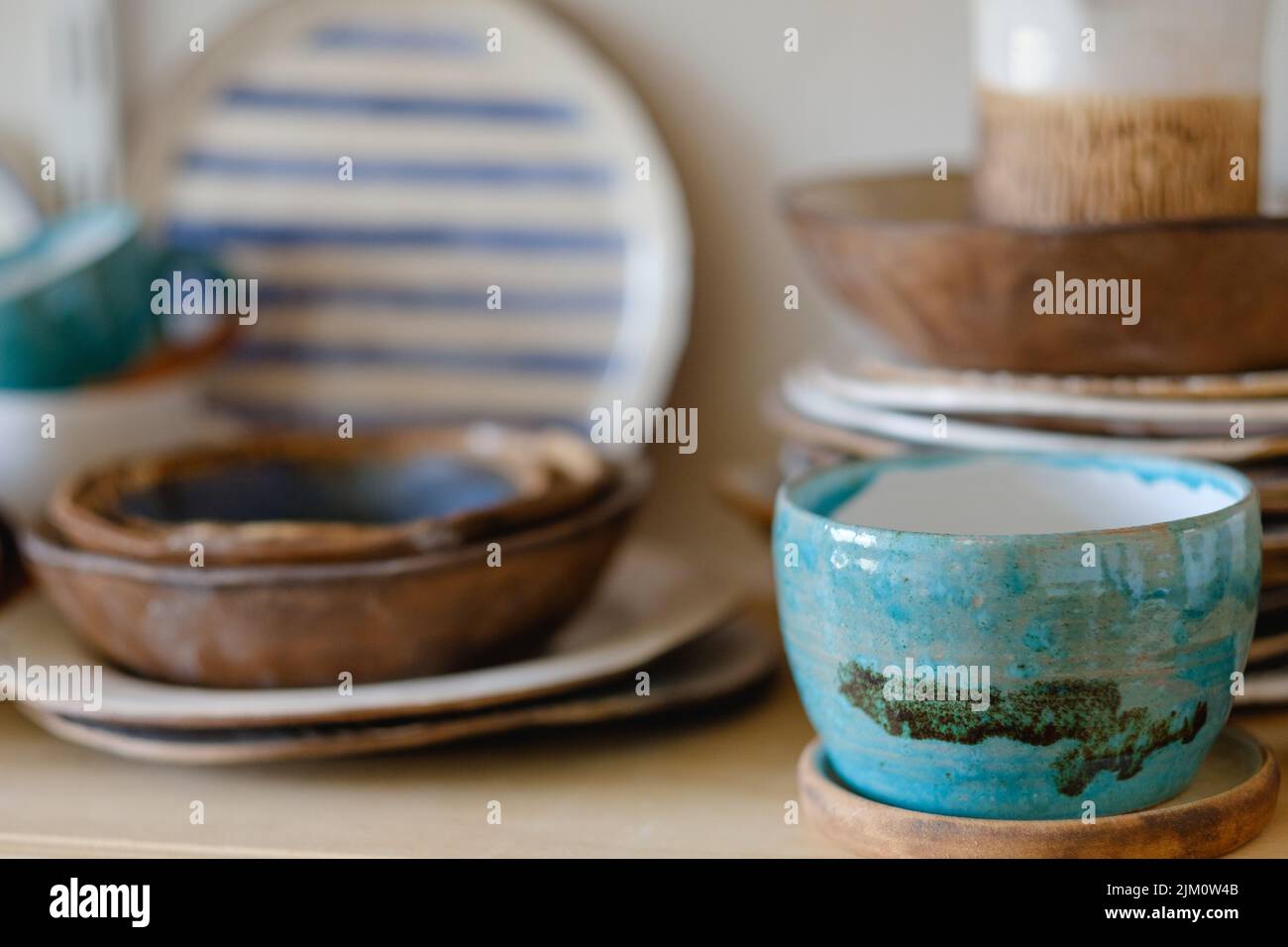 pottery handcraft hobby clay plate jug assortment Stock Photo - Alamy