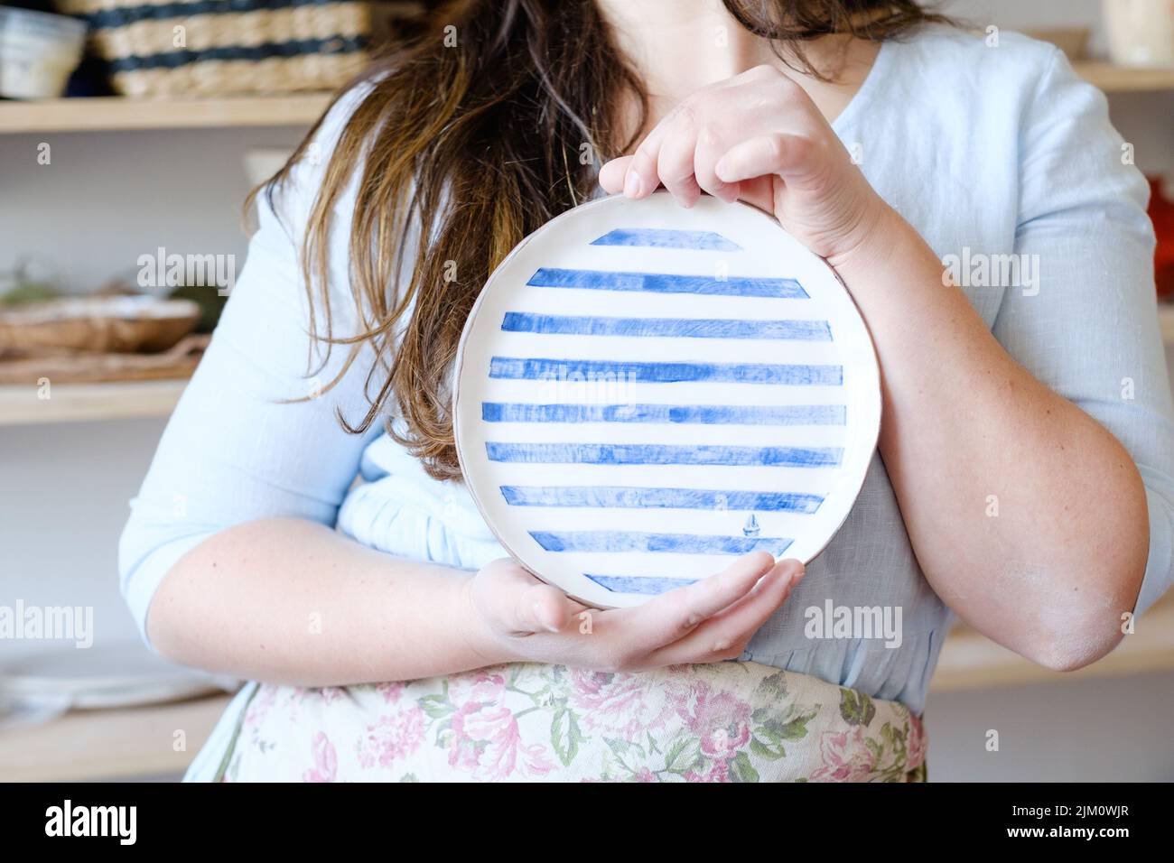 pottery workshop show plate handmade crockery Stock Photo - Alamy