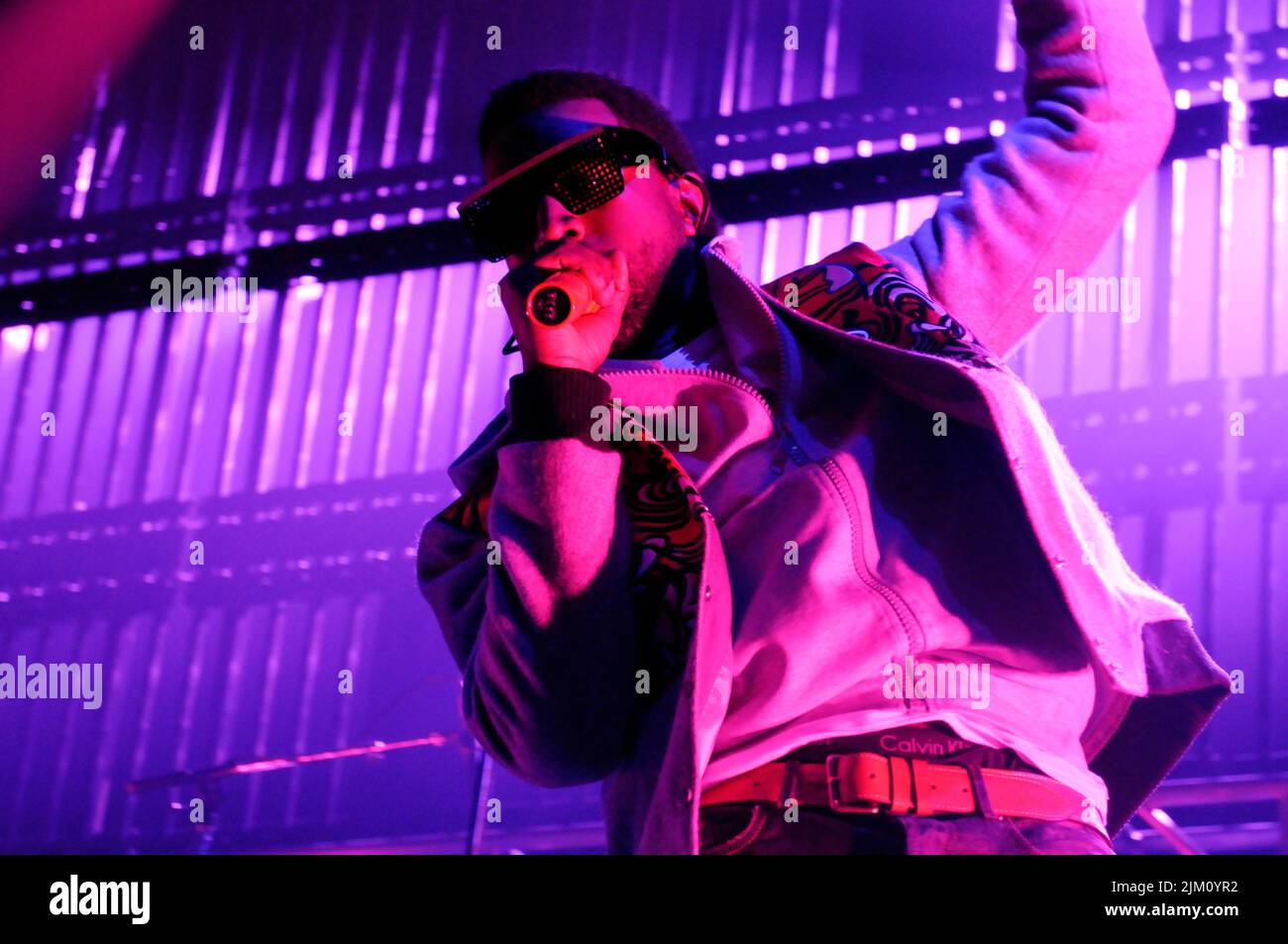 A closeup of Kanye West performing live at the Gibson Amphitheatre in ...