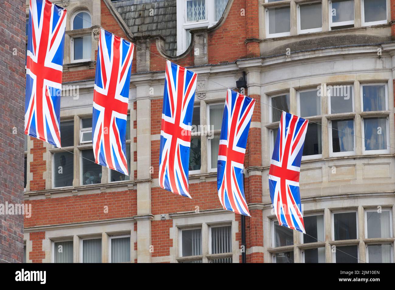 Great Britain Union Jack flags above Oxford Street shopping centre ...