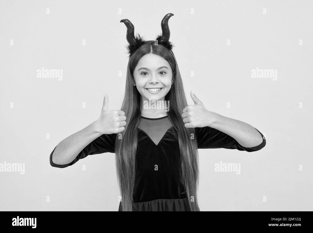 kid wear devil horns show thumb up. childhood autumn holiday. funny ...