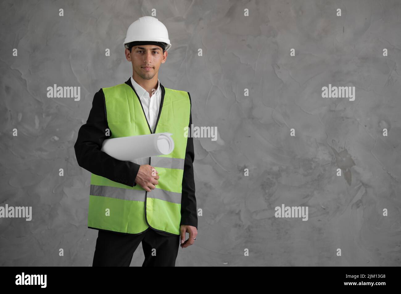 Portrait of civil architect studying floor plan, serious civil engineer ...