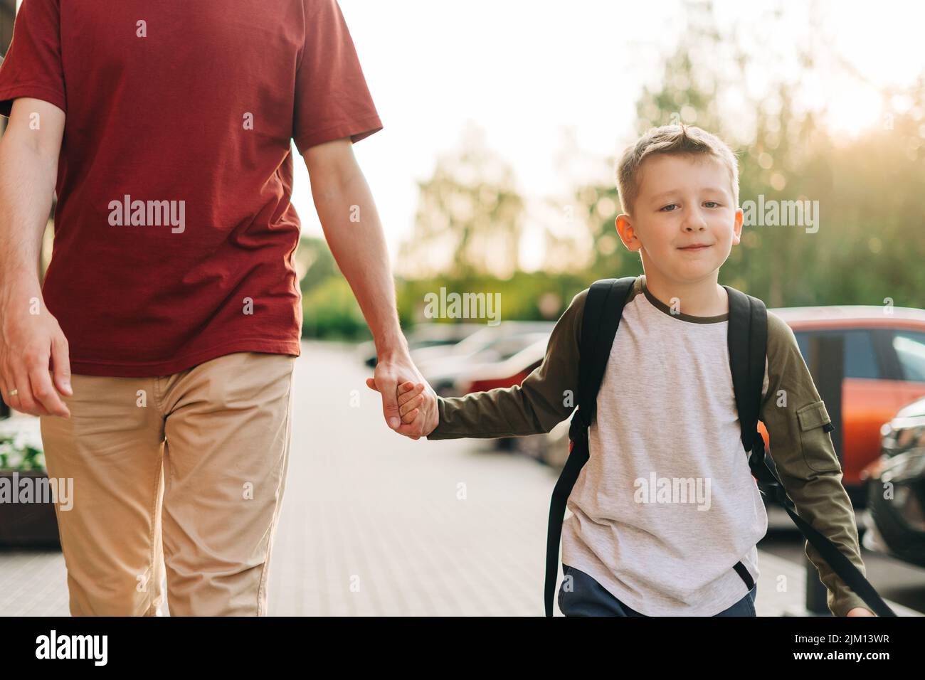 Happy father and kid son going to classes. Parent take child boy to ...