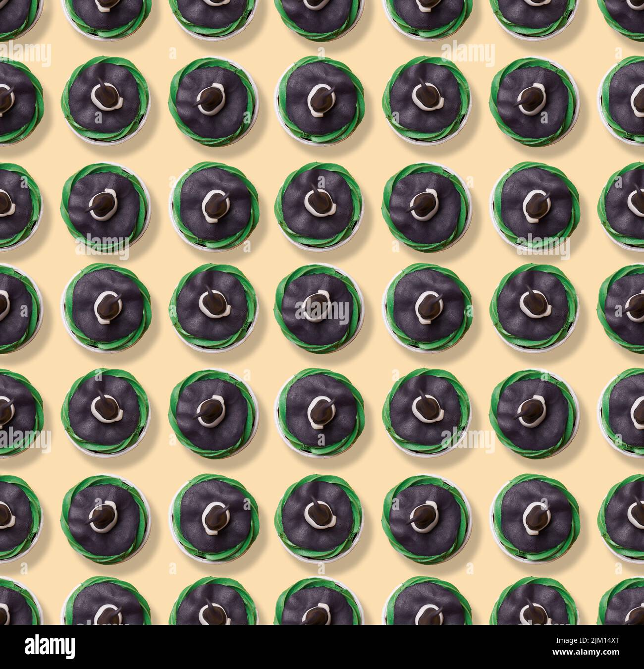 Seamless pattern of Halloween treat maffin decorated witch hats. Happy ...