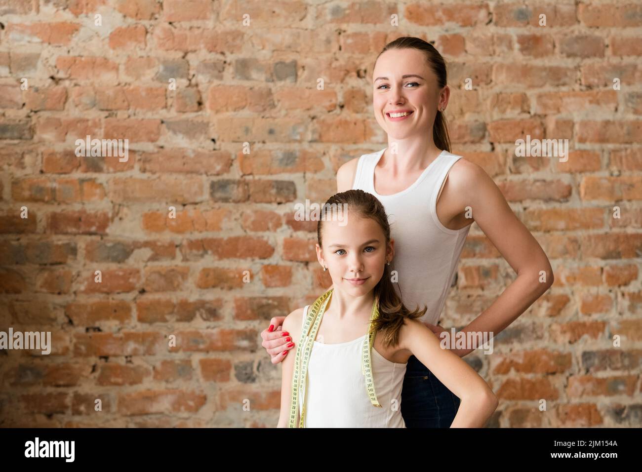 healthy fit family lifestyle daughter watch figure Stock Photo - Alamy
