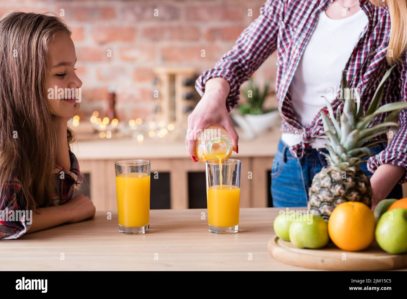 orange juice balanced healthy family lifestyle Stock Photo - Alamy