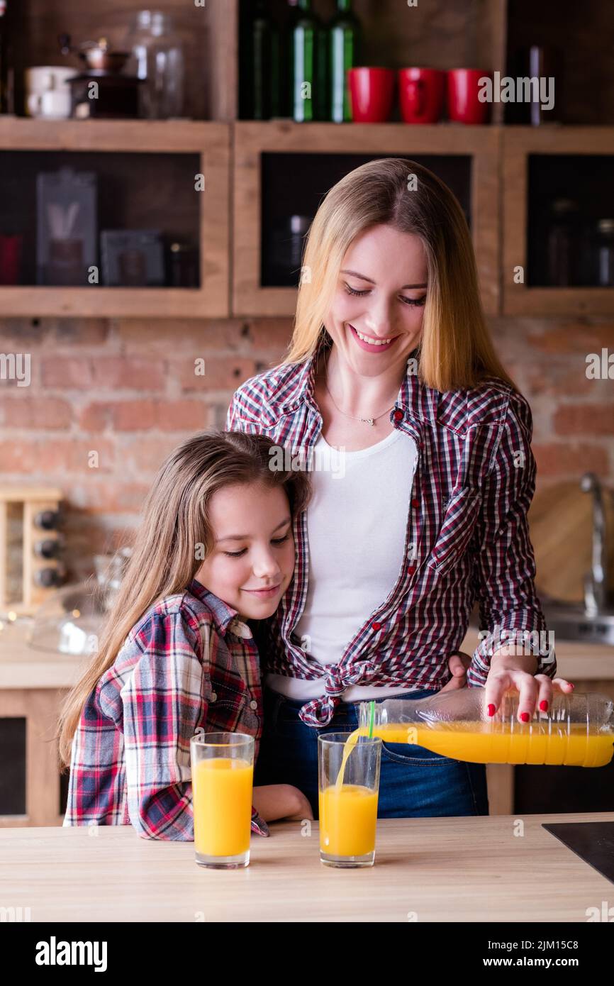 Pouring juice kid hi-res stock photography and images - Alamy