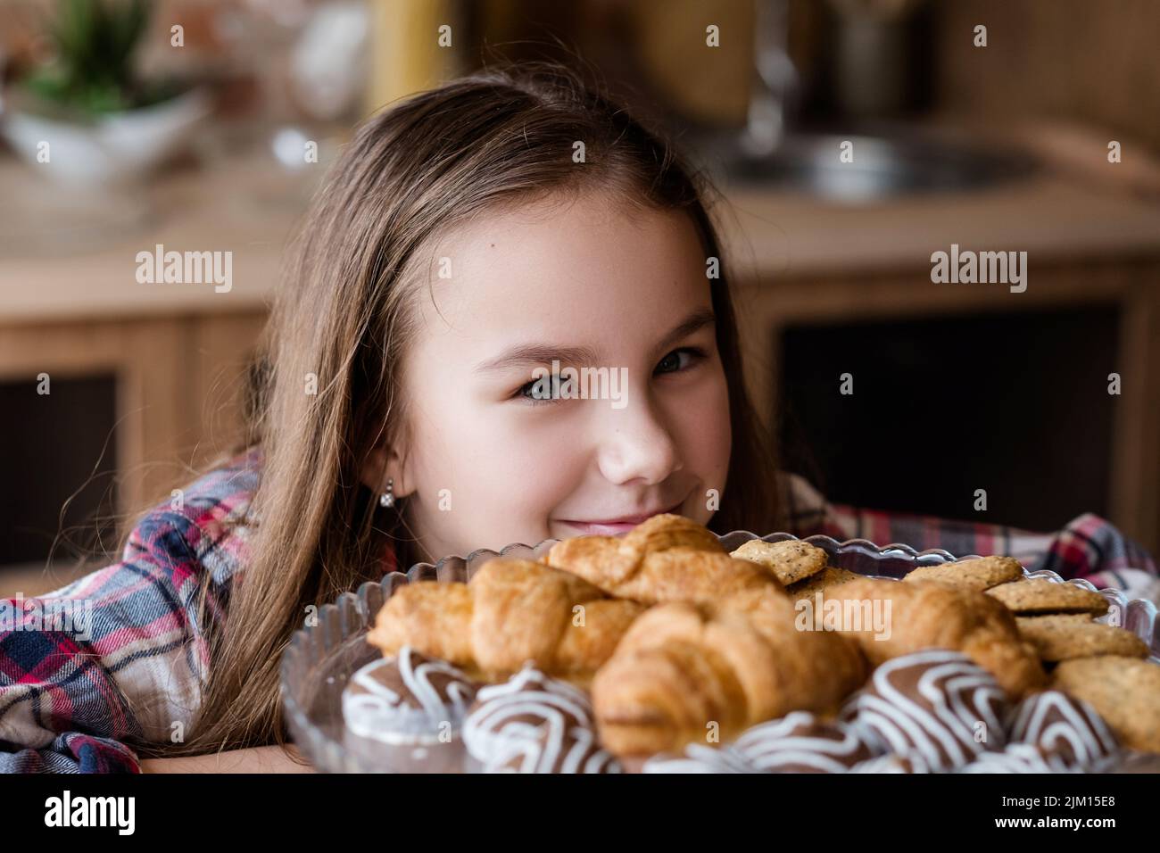 child sugar addiction croissant chocolate eating Stock Photo - Alamy