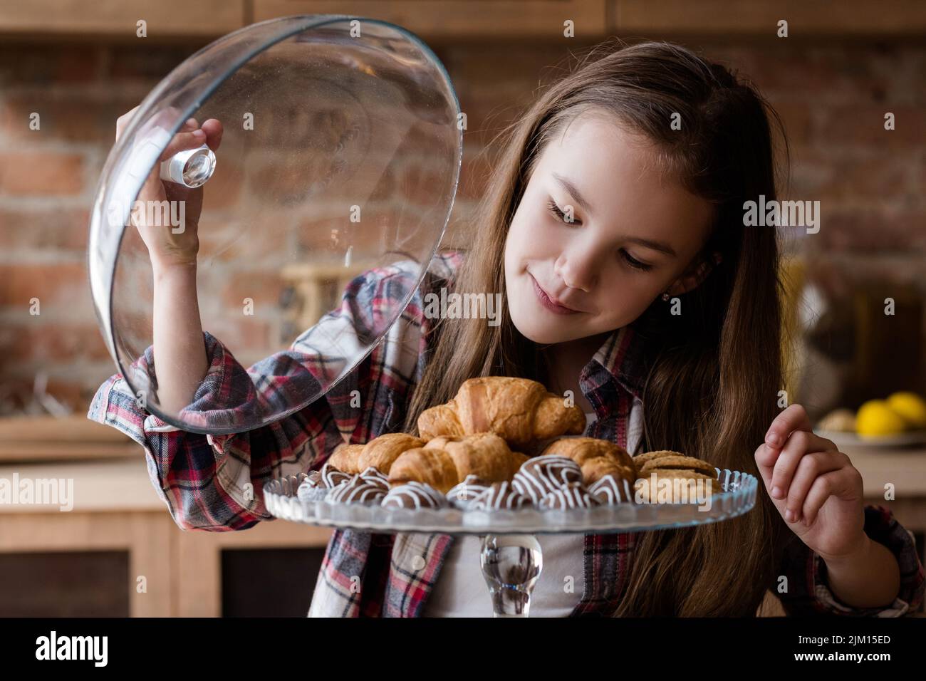 child unbalanced eating habits sweets overeating Stock Photo - Alamy