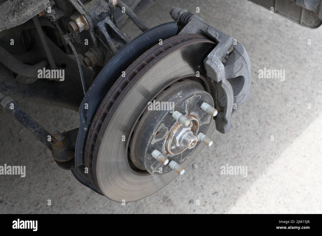 brake disk and detail of the wheel hub, removed tire. Change tire Stock ...