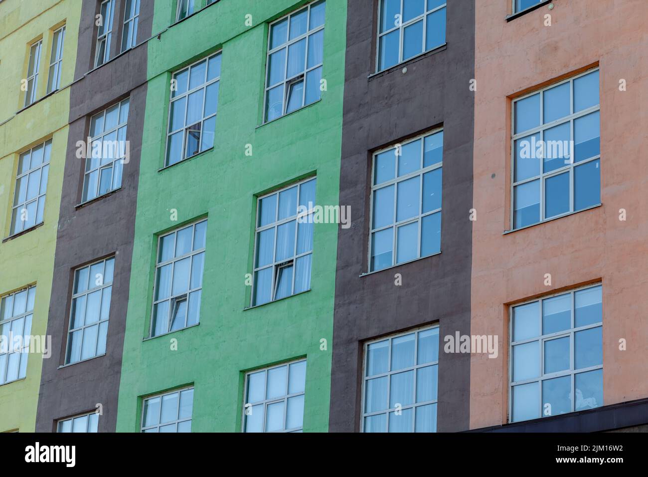 The exterior of a tall building with windows. A newly built building ...