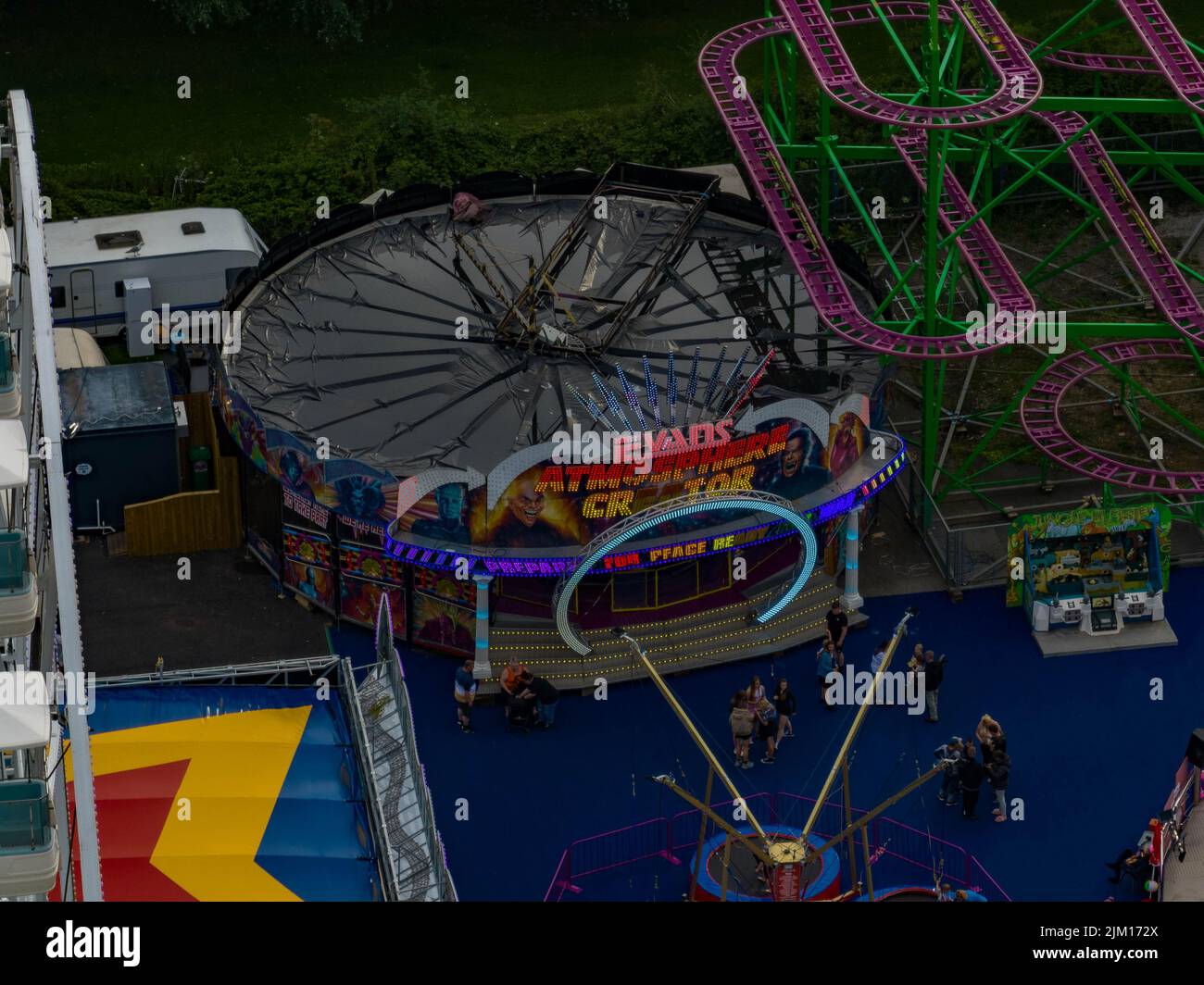 Colorful funfair at Towyn North Wales From the air, Aerial Drone, Birds ...